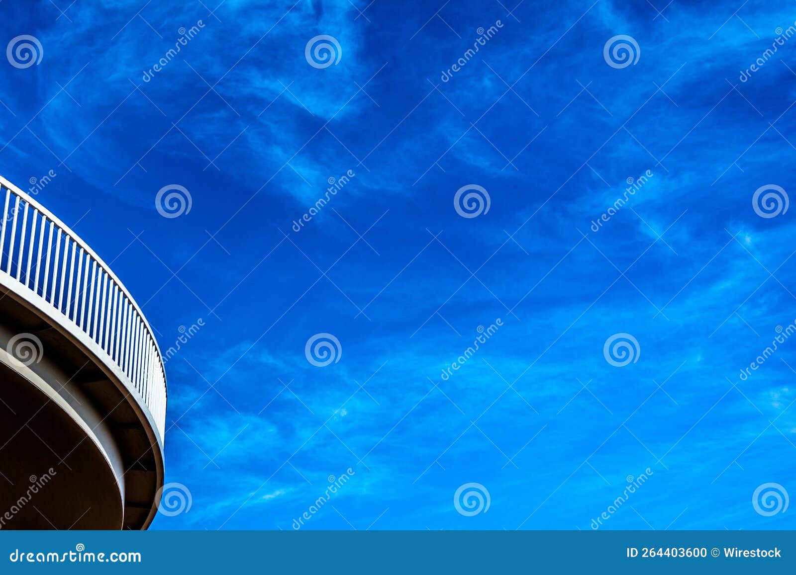Low Angle of a Modern Round Balcony Under Blue Sky Stock Photo - Image ...