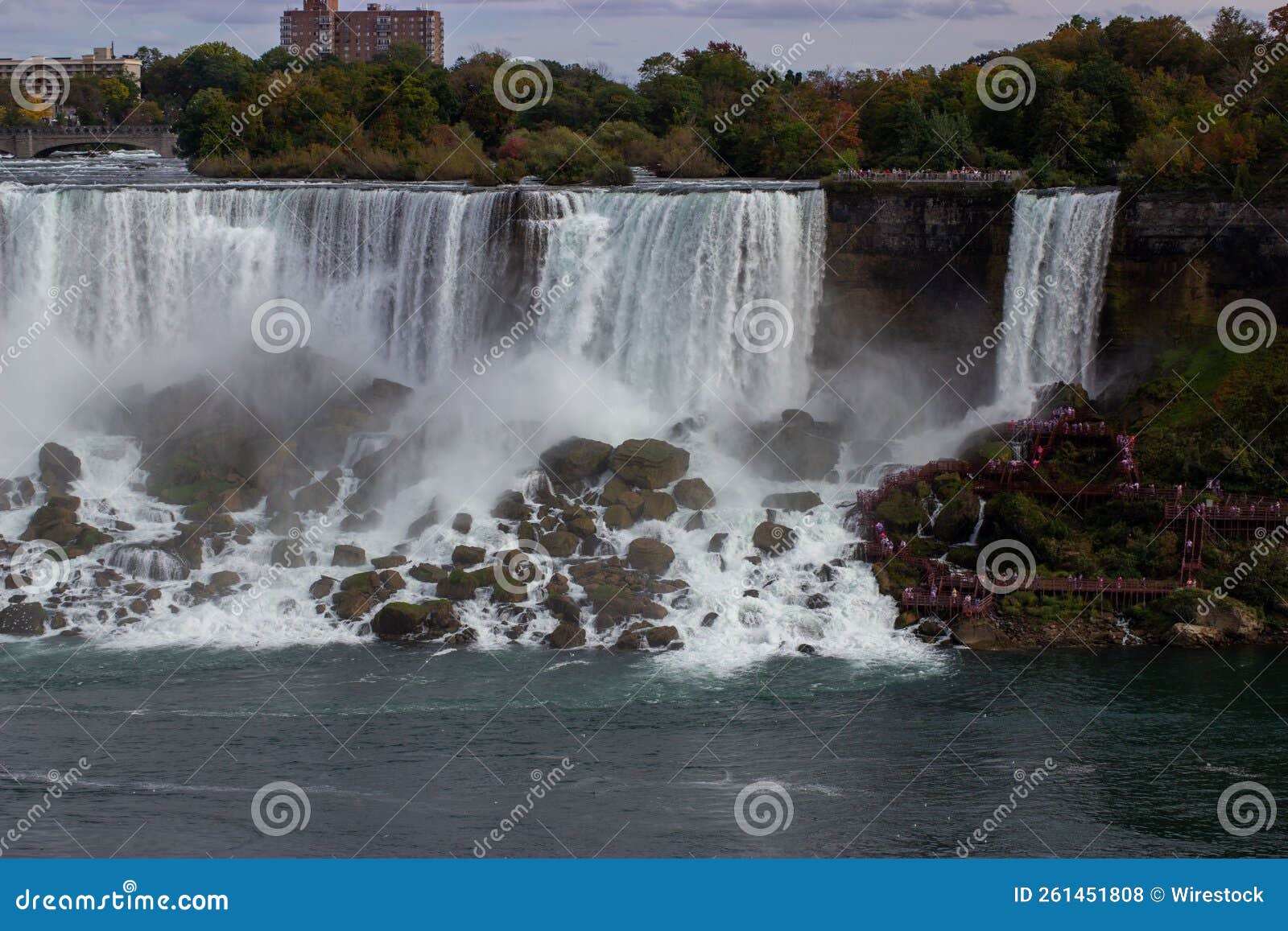 Low-angle of Niagara Falls with Trees and Sky Background Stock Photo ...