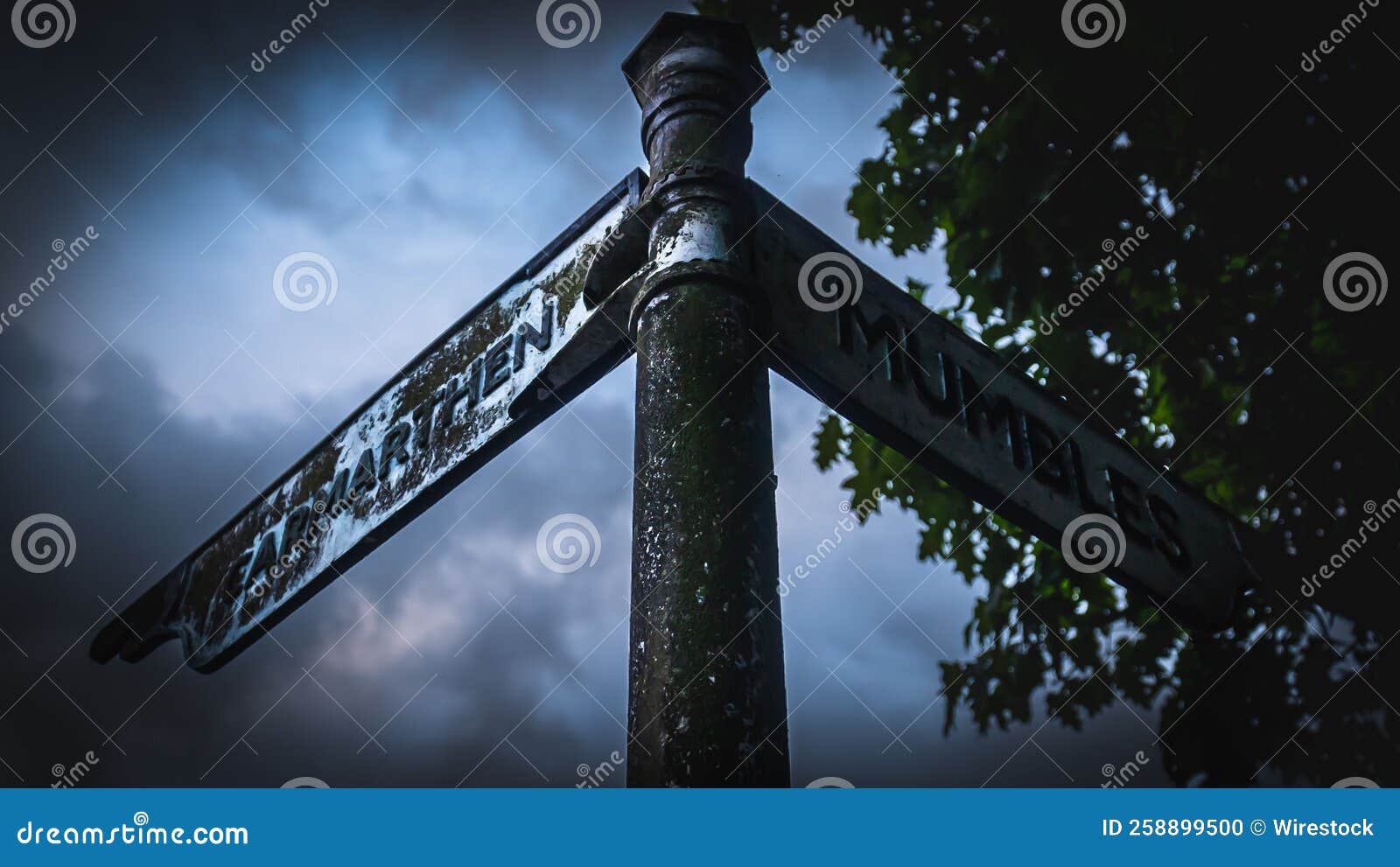 Low Angle of an Old Rusted Signpost on a Gloomy Day Stock Photo - Image ...