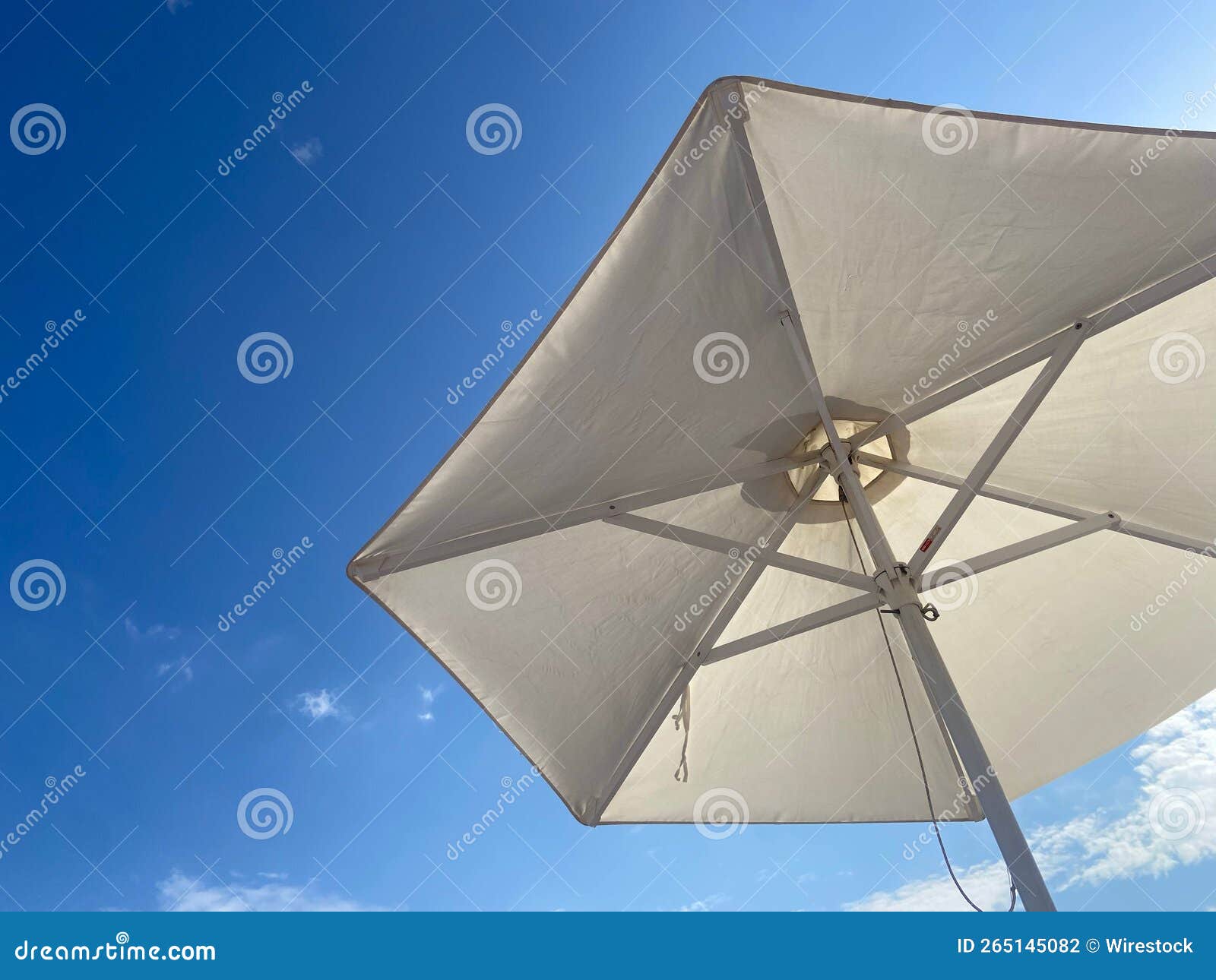 Low Angle of a Parasol with Blue Sky on the Background Stock Photo ...