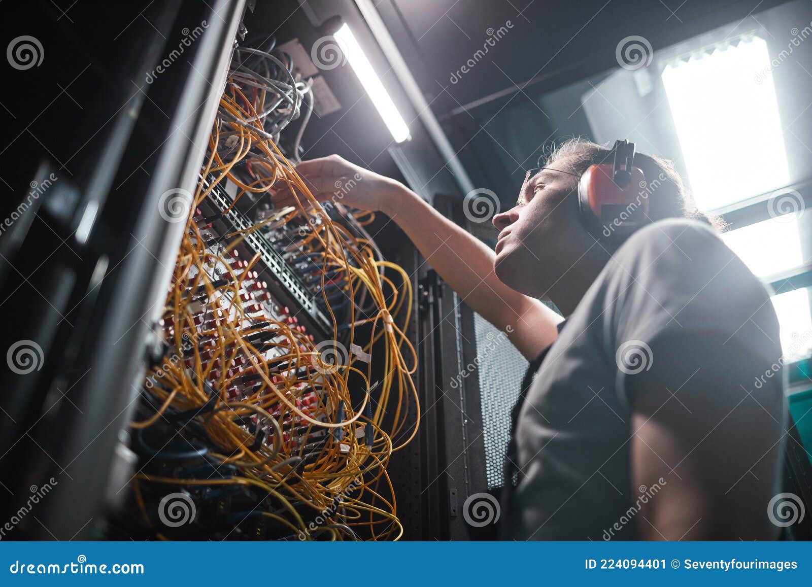 Young Engineer in Server Room Stock Image - Image of network ...