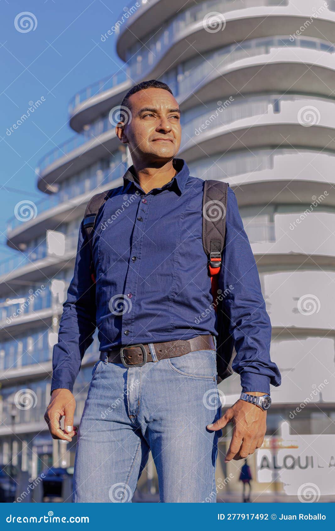 Low Angle Portrait of Young Latino Man in a City Stock Photo - Image of ...