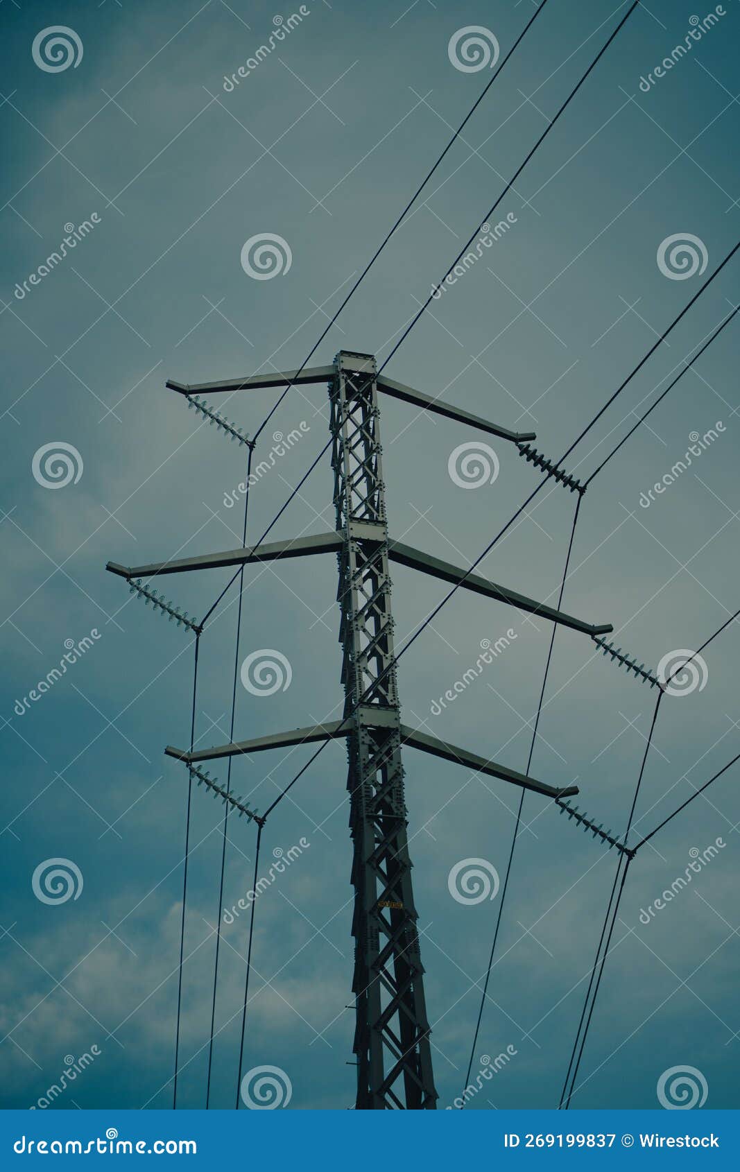 Low Angle of a Pylon Tower Supporting Electrical Cables Against the ...