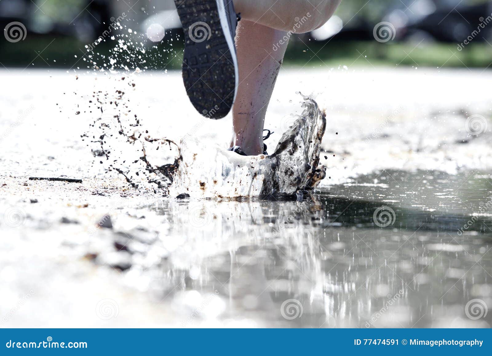 Low Angle Runner Splash in Puddle Stock Image - Image of health, ground ...
