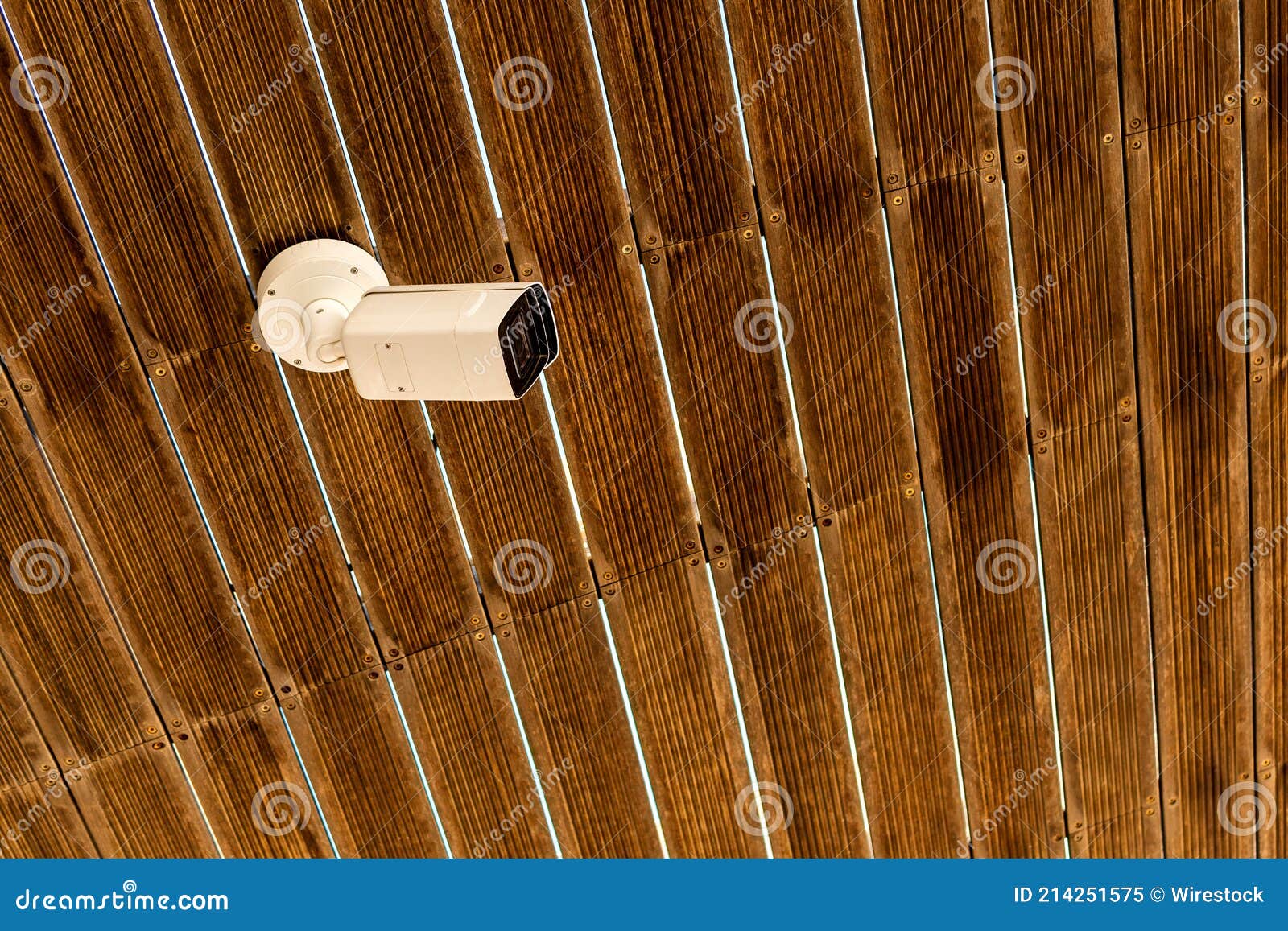 Low Angle of a Security Camera Installed on a Wooden Ceiling Stock ...