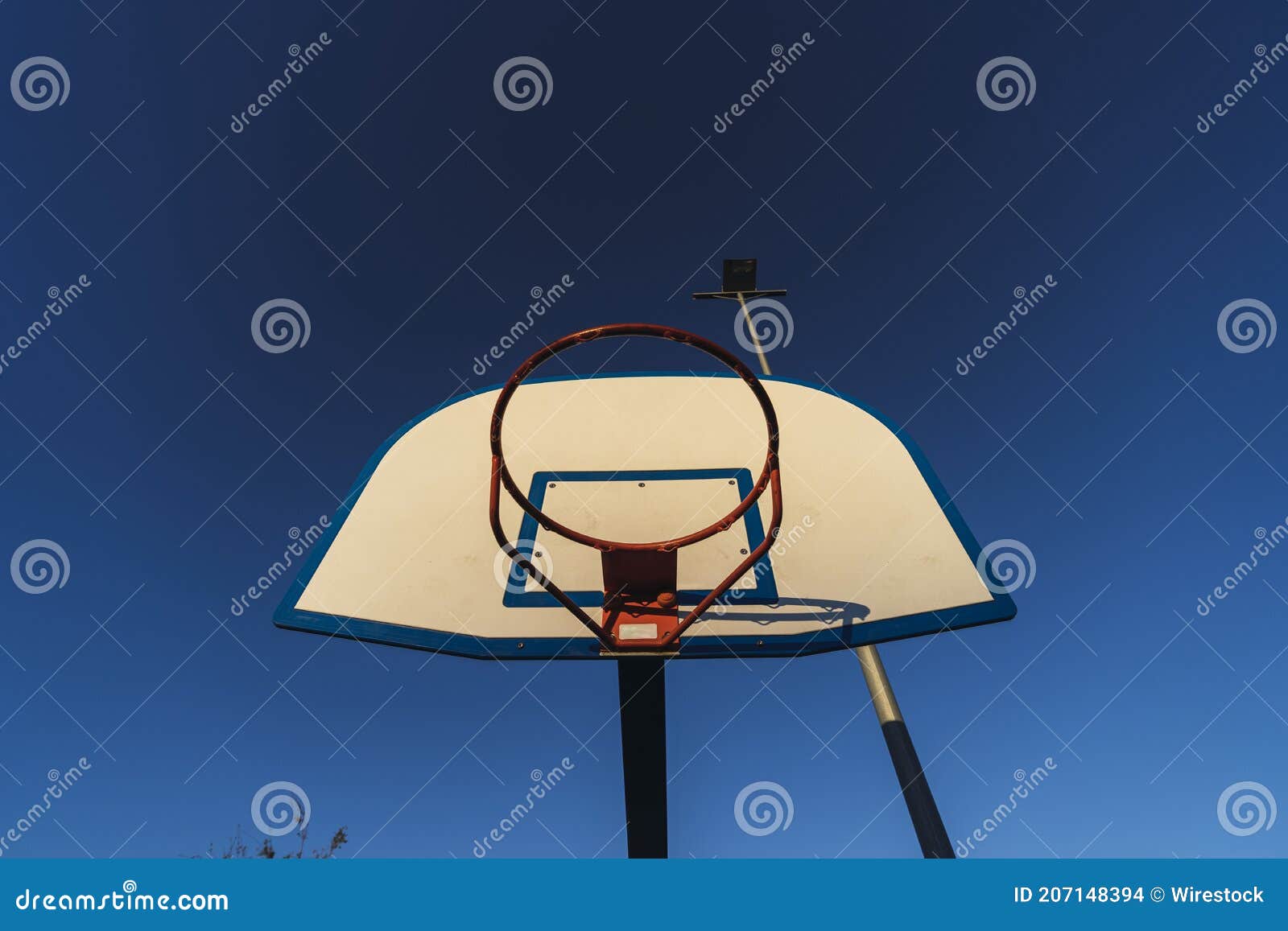 Low Angle Shot of a Basketball Hoop without a Net Stock Photo - Image ...