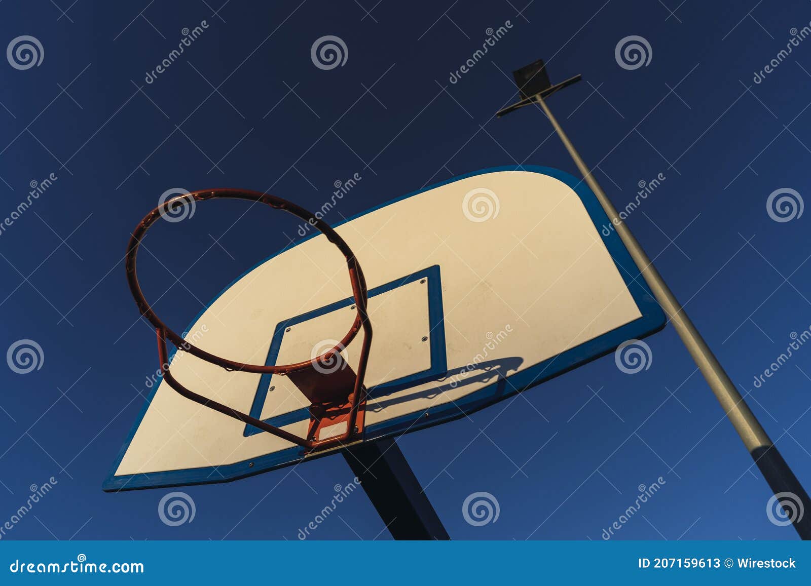 Low Angle Shot of a Basketball Hoop without a Net Stock Image - Image ...