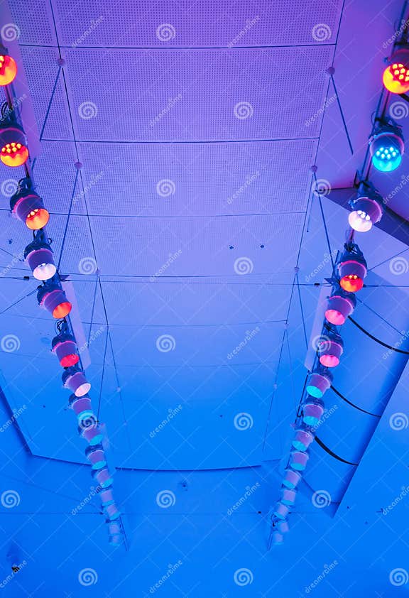 Low Angle Shot of a Blue Gradient Ceiling with Colorful Lights Hanging ...