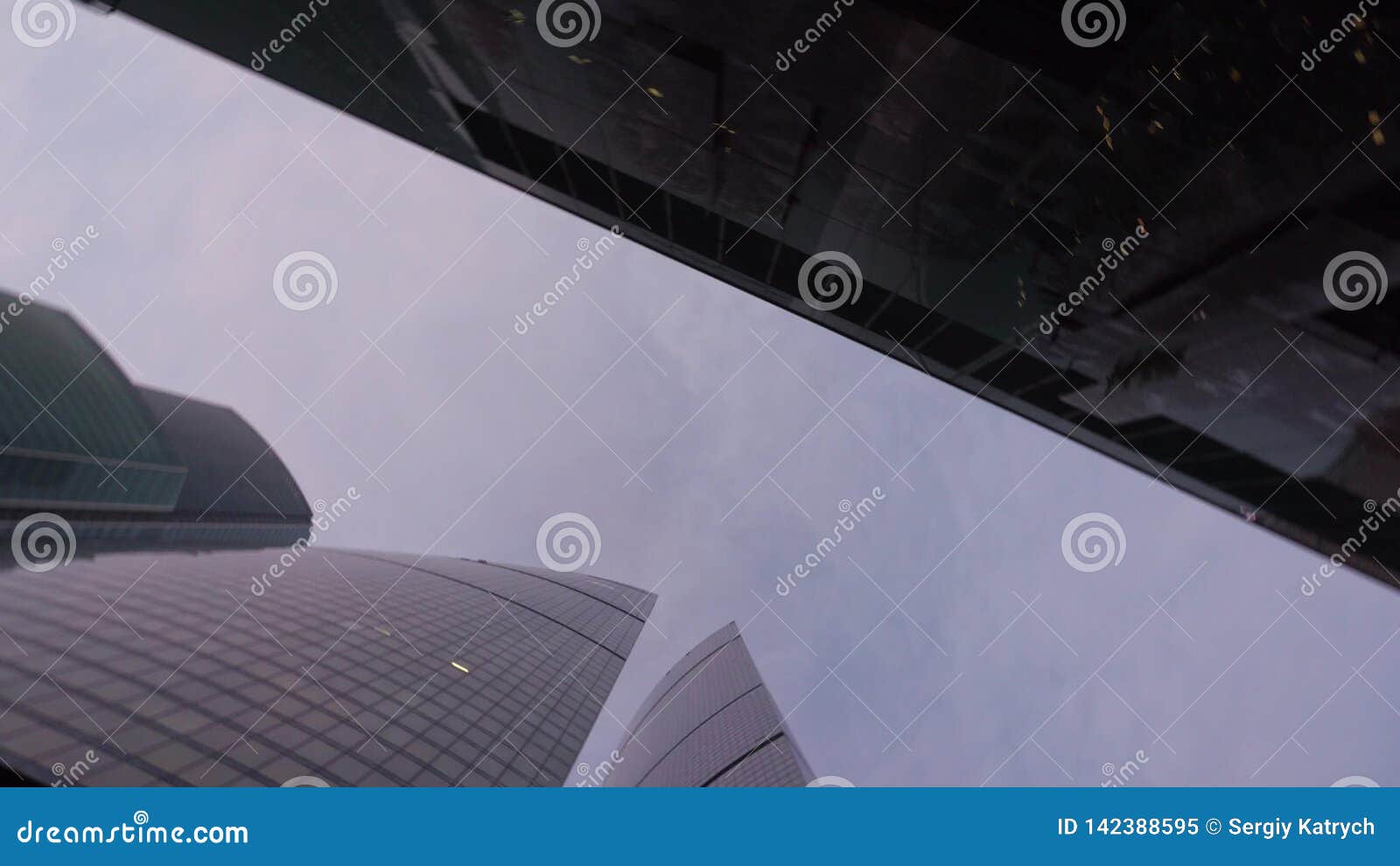 Low Angle Shot of Camera Rotating in Front of Modern, Office Tower ...