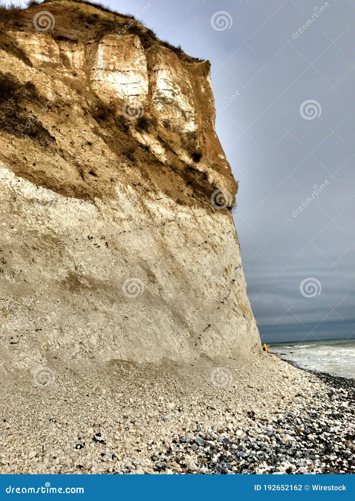 Low Angle Shot of a Cliff Under the Blue Sky Stock Photo - Image of ...