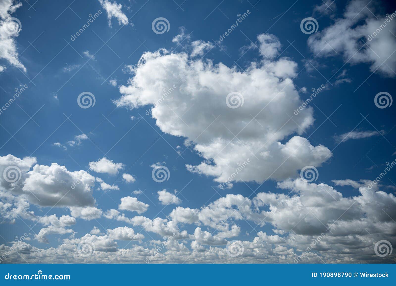 Low Angle Shot of the Clouds in the Bright Blue Sky Stock Photo - Image ...
