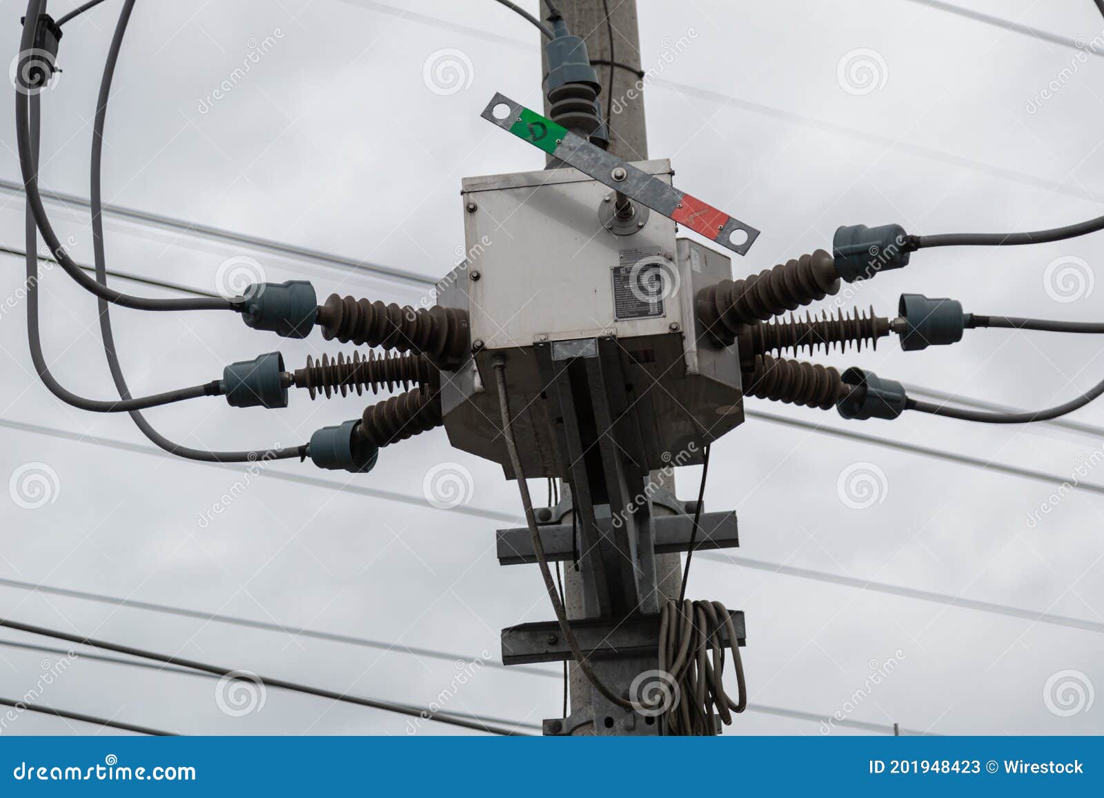Low Angle Shot of an Electrical Power Post Under a Cloudy Sky Stock ...