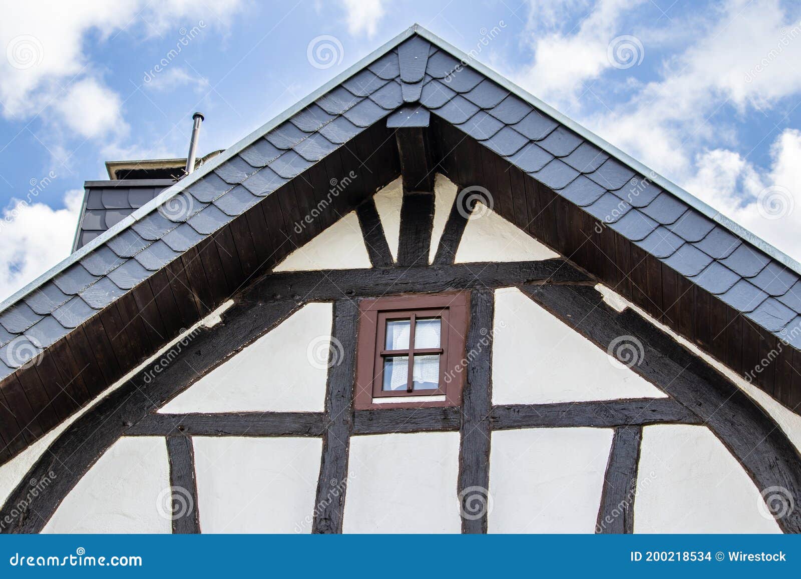 Low Angle Shot of a Facade of a House Stock Photo - Image of cloud ...