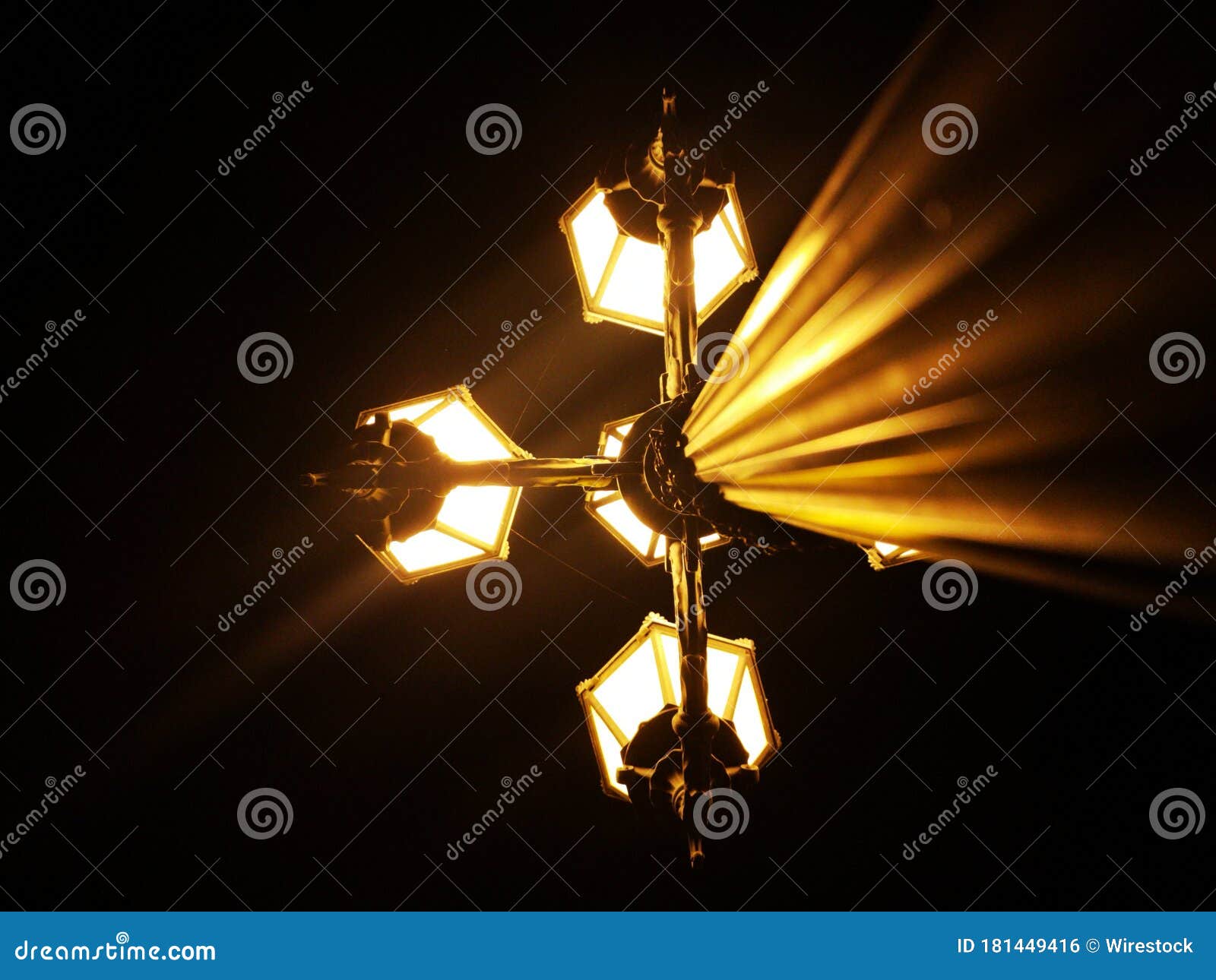 Low Angle Shot of a Glowing Street Light at Night Stock Photo - Image ...