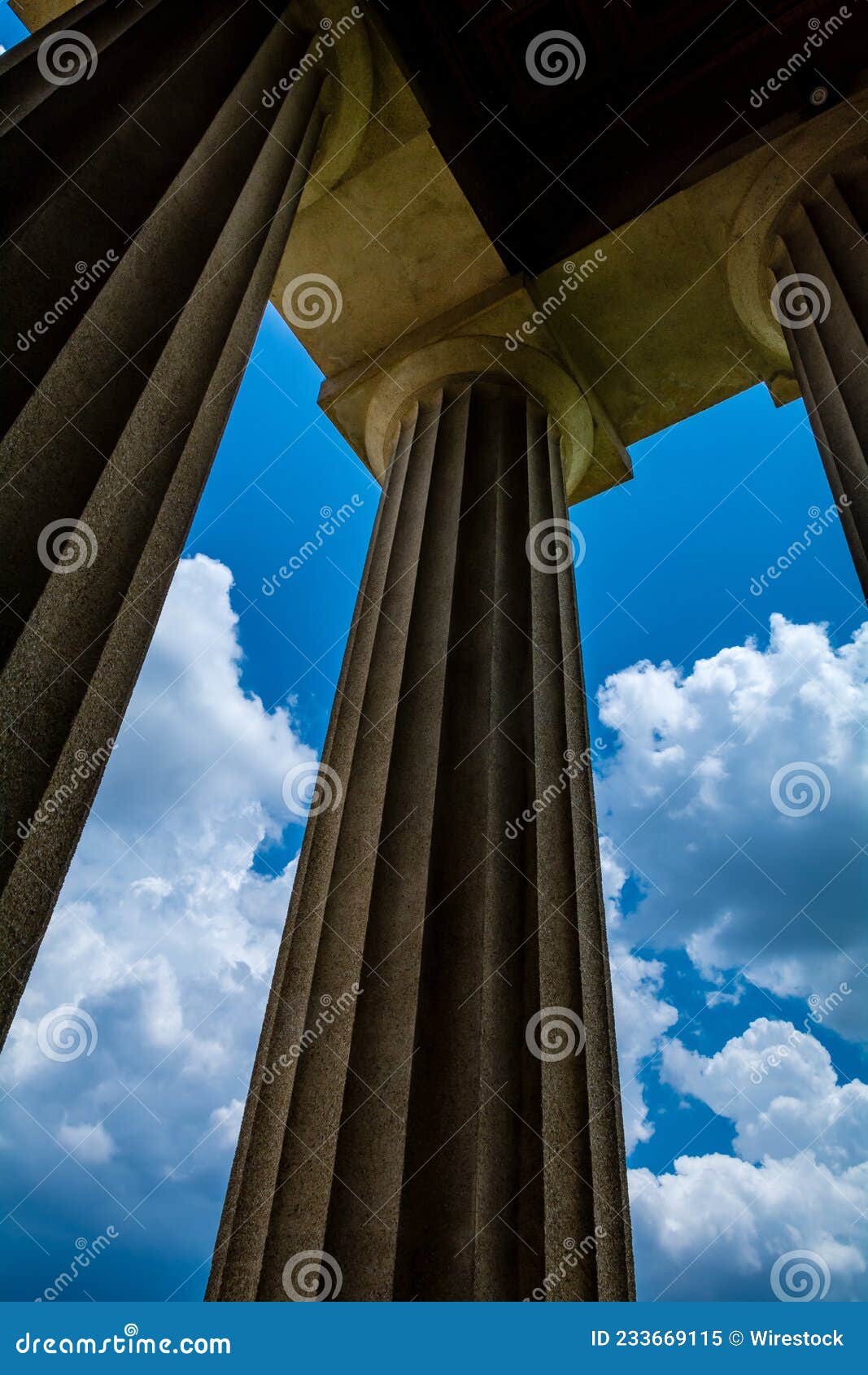 Low Angle Shot of High Columns Supporting the Roof of the Building ...