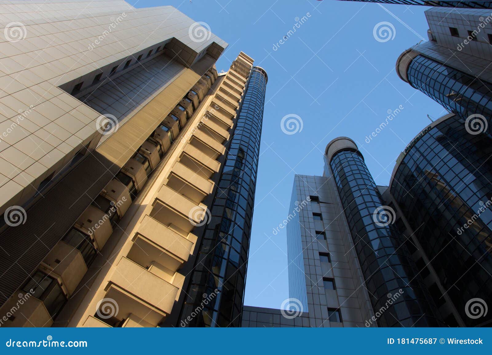 Low Angle Shot of High-rise Buildings Under a Clear Blue Sky Editorial ...
