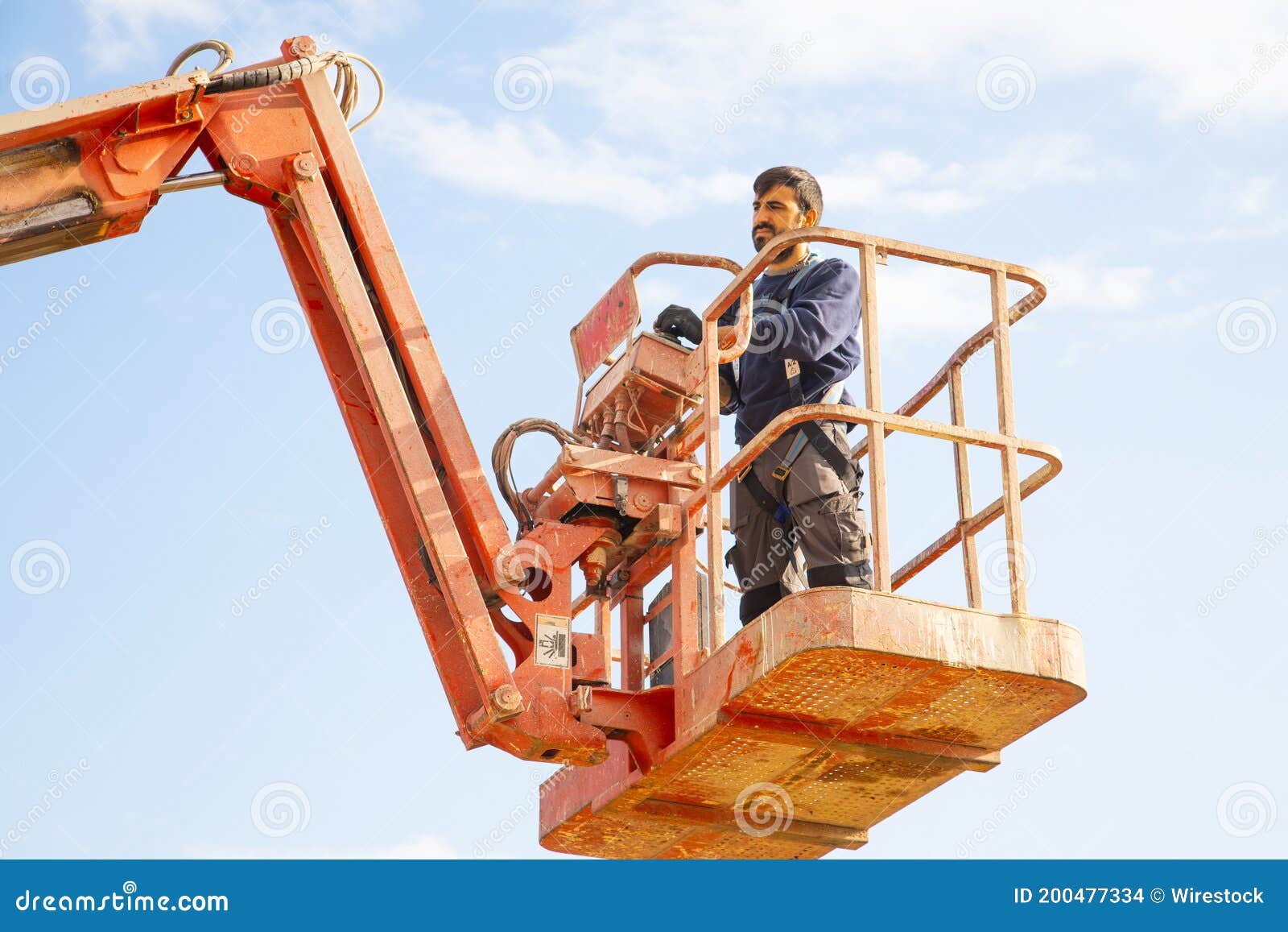 Low Angle Shot of a Man Working at a Construction Site - Concept of ...