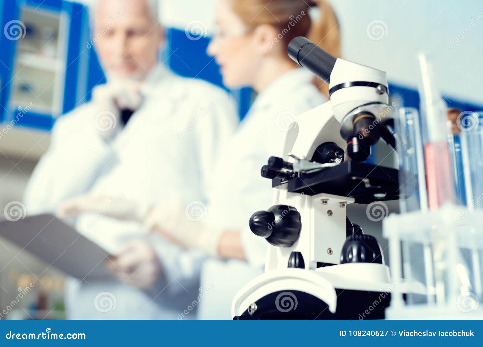 Low Angle Shot of Microscope in Lab Stock Image - Image of coat, medic ...