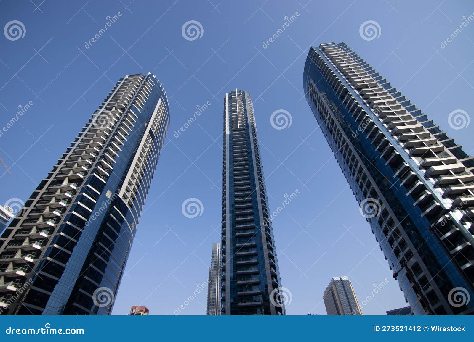 Low-angle Shot of Modern Buildings with Multiple Windows Reflecting the ...
