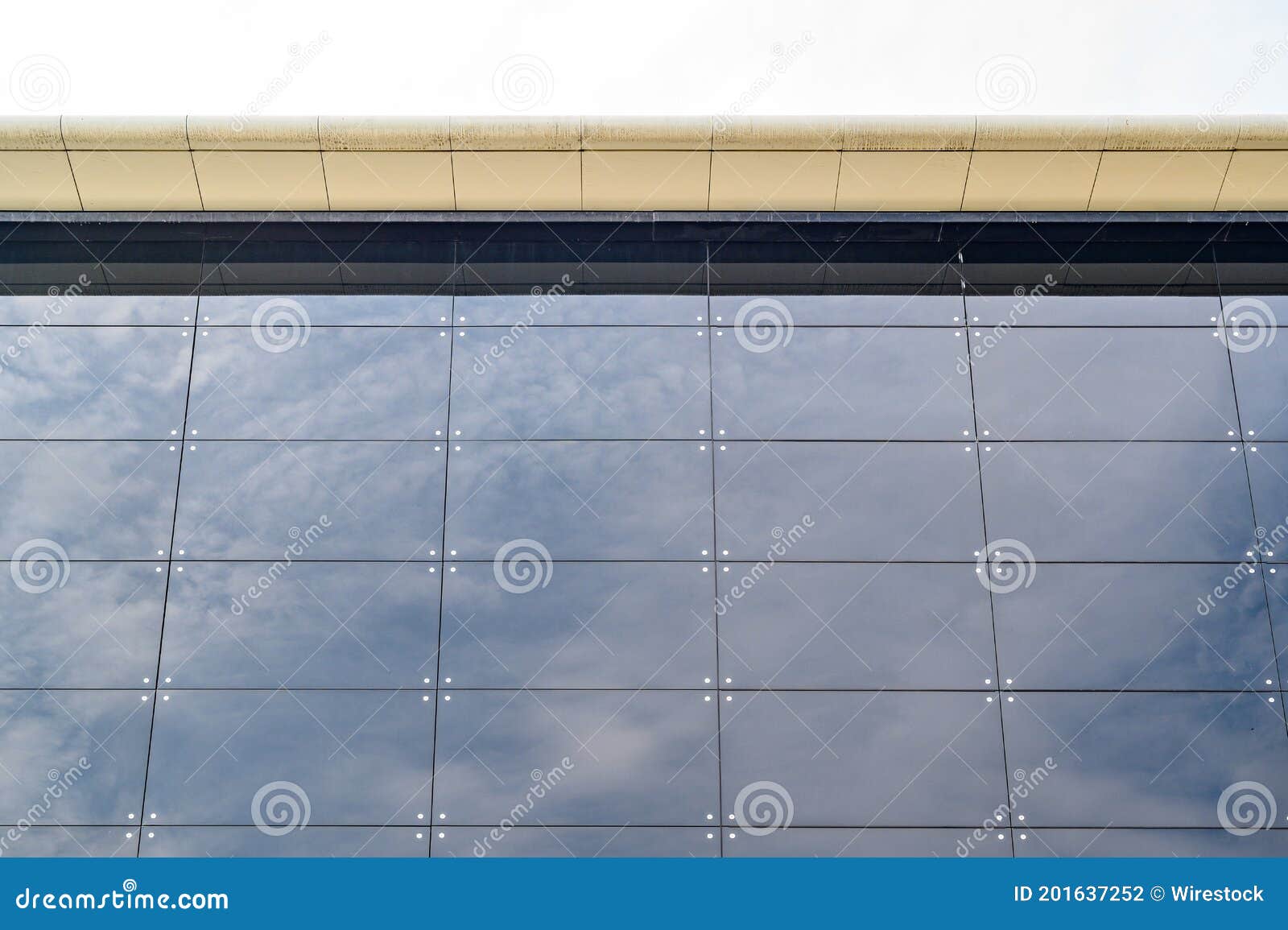 Low Angle Shot of Modern Glass Windows with the Reflection of the Sky ...