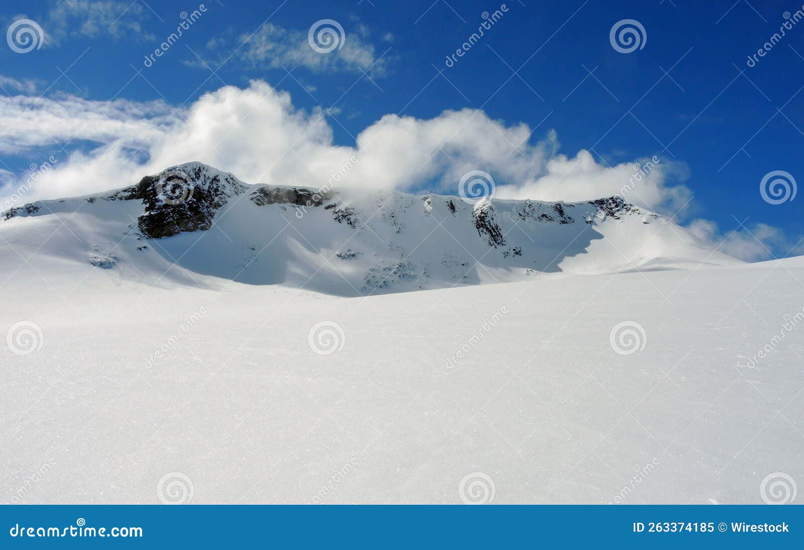 Low-angle Shot of a Mountain Covered with Snow Stock Image - Image of ...