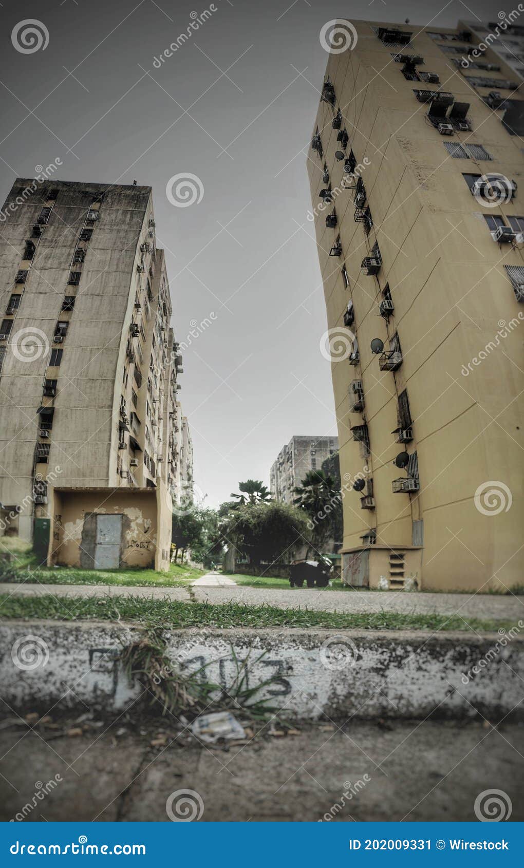 Low Angle Shot of an Old Damaged Buildings of a Gray District Stock ...