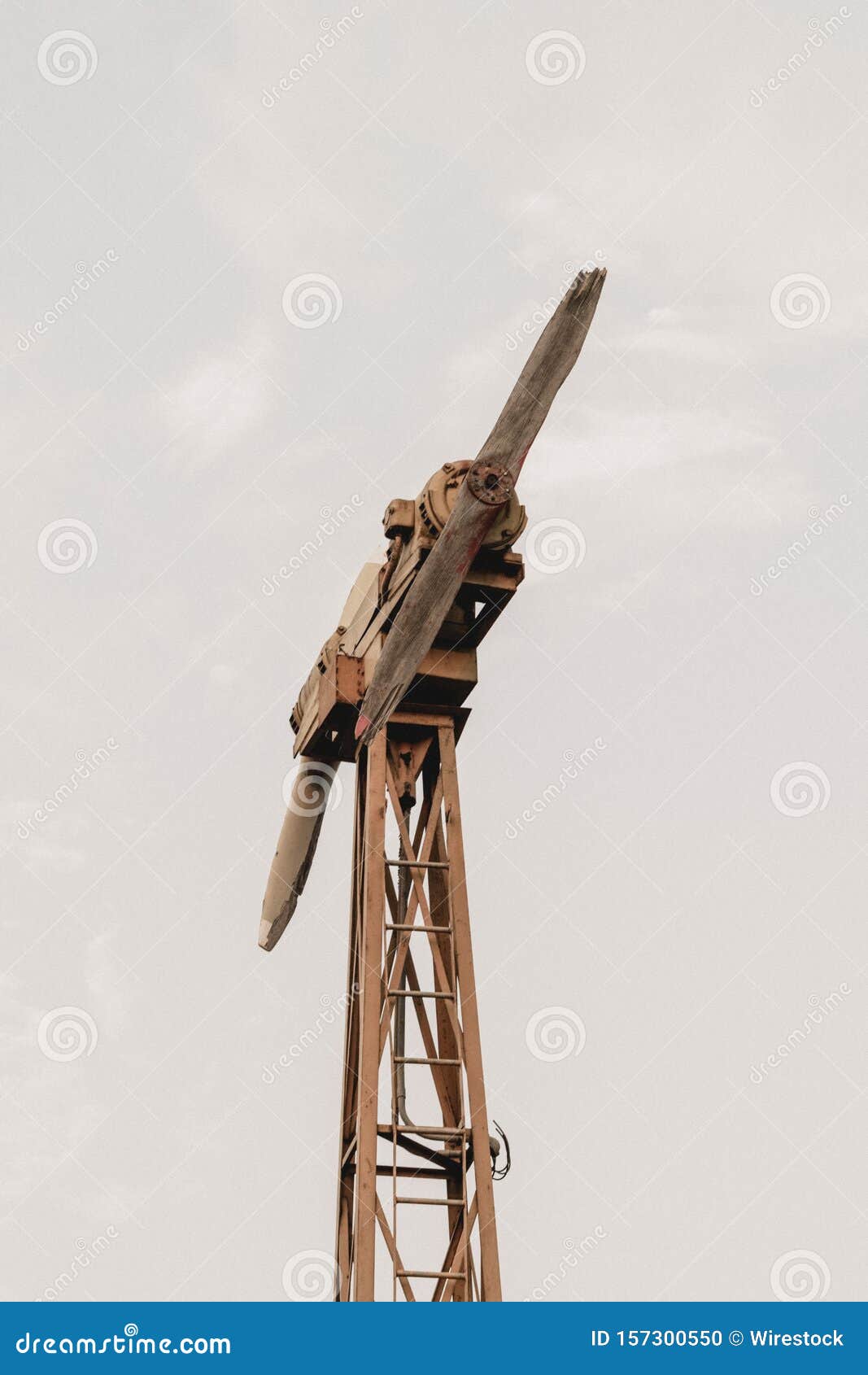Low Angle Shot of an Old Rusty Windmill with a Clear Sky in the ...