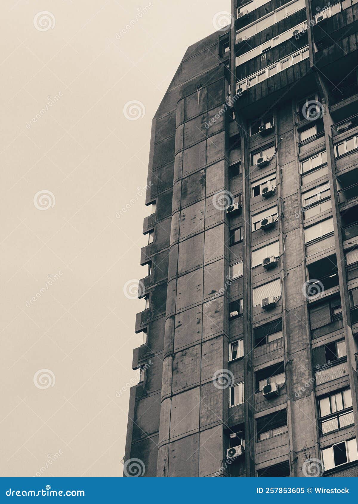 Low Angle Shot of an Old Tall Building Under a Gloomy Sky Stock Image ...
