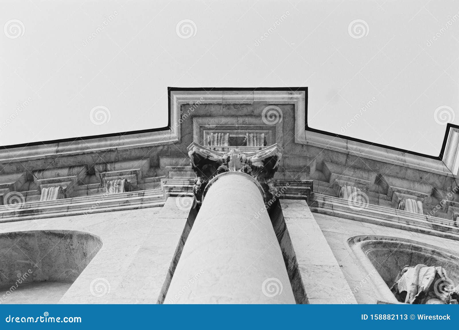 Low Angle Shot of a Pillar with a Clear Sky in the Background in Black ...