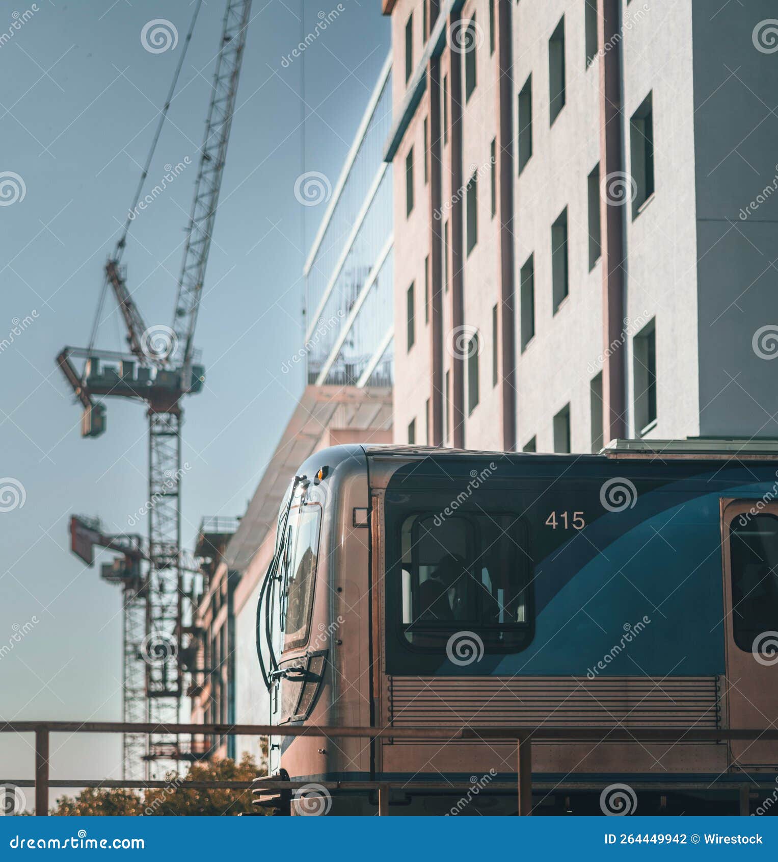 Low Angle Shot of a Public Transport and a Process of Construction on ...