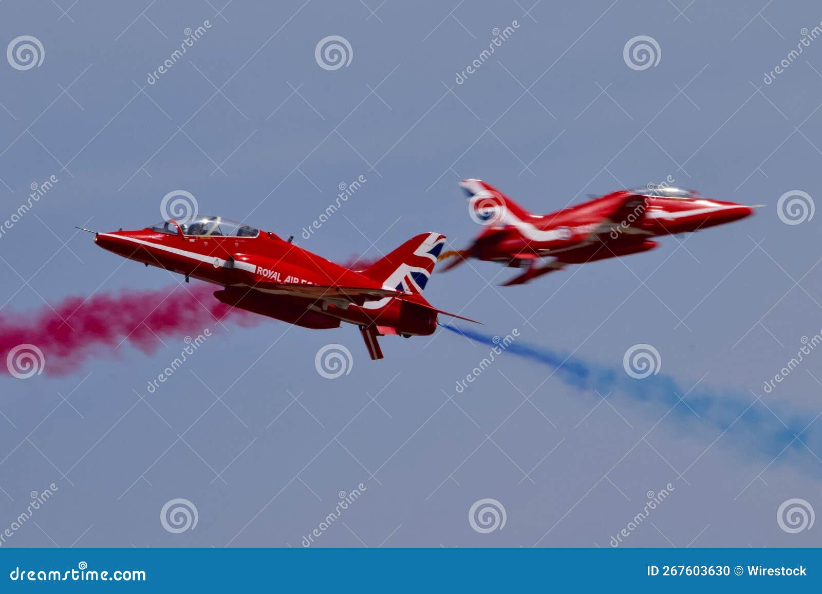 Low Angle Shot of the RAF Red Arrows Syncro Pair Crossover in the ...