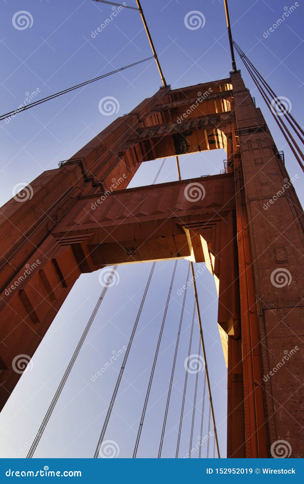 Low Angle Shot of a Red Suspension Bridge with Amazing Clear Blue Sky ...