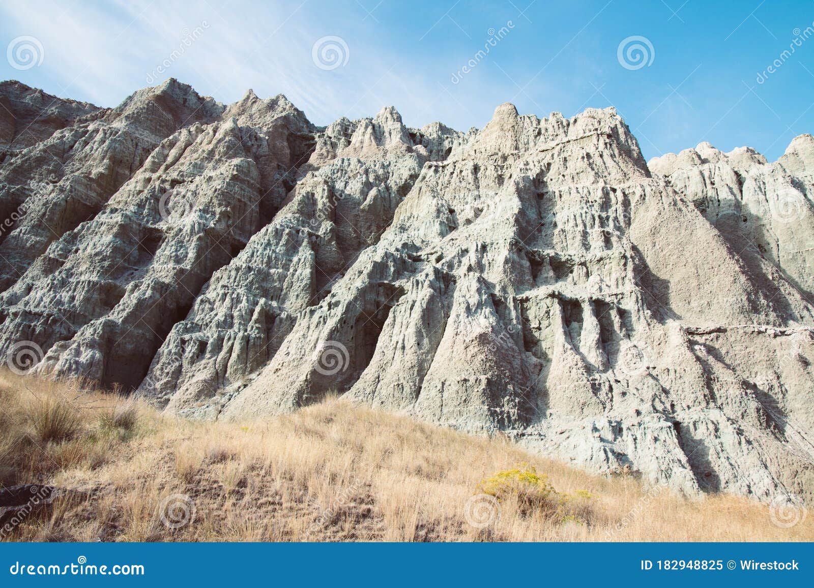 Low Angle Shot of a Rocky Cliff Under the Blue Sky Stock Image - Image ...