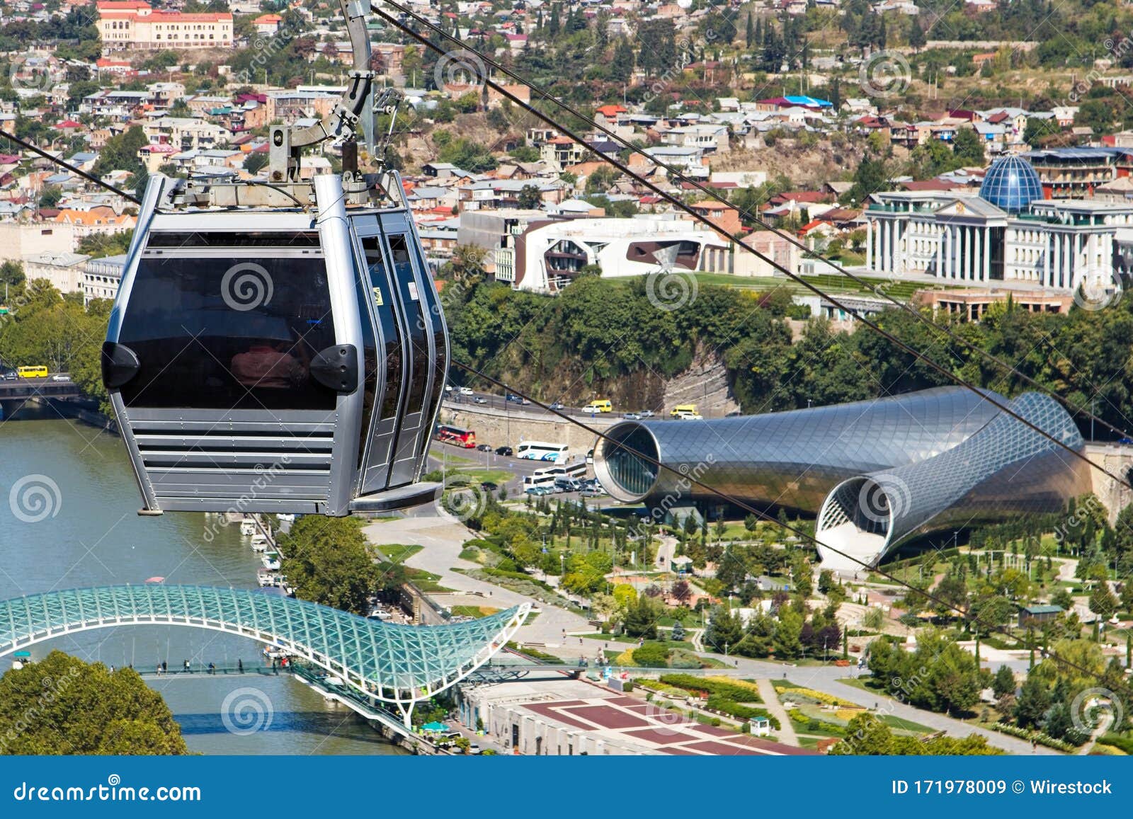 Low Angle Shot of a Ropeway Over the City Under the Clear Sky Editorial ...
