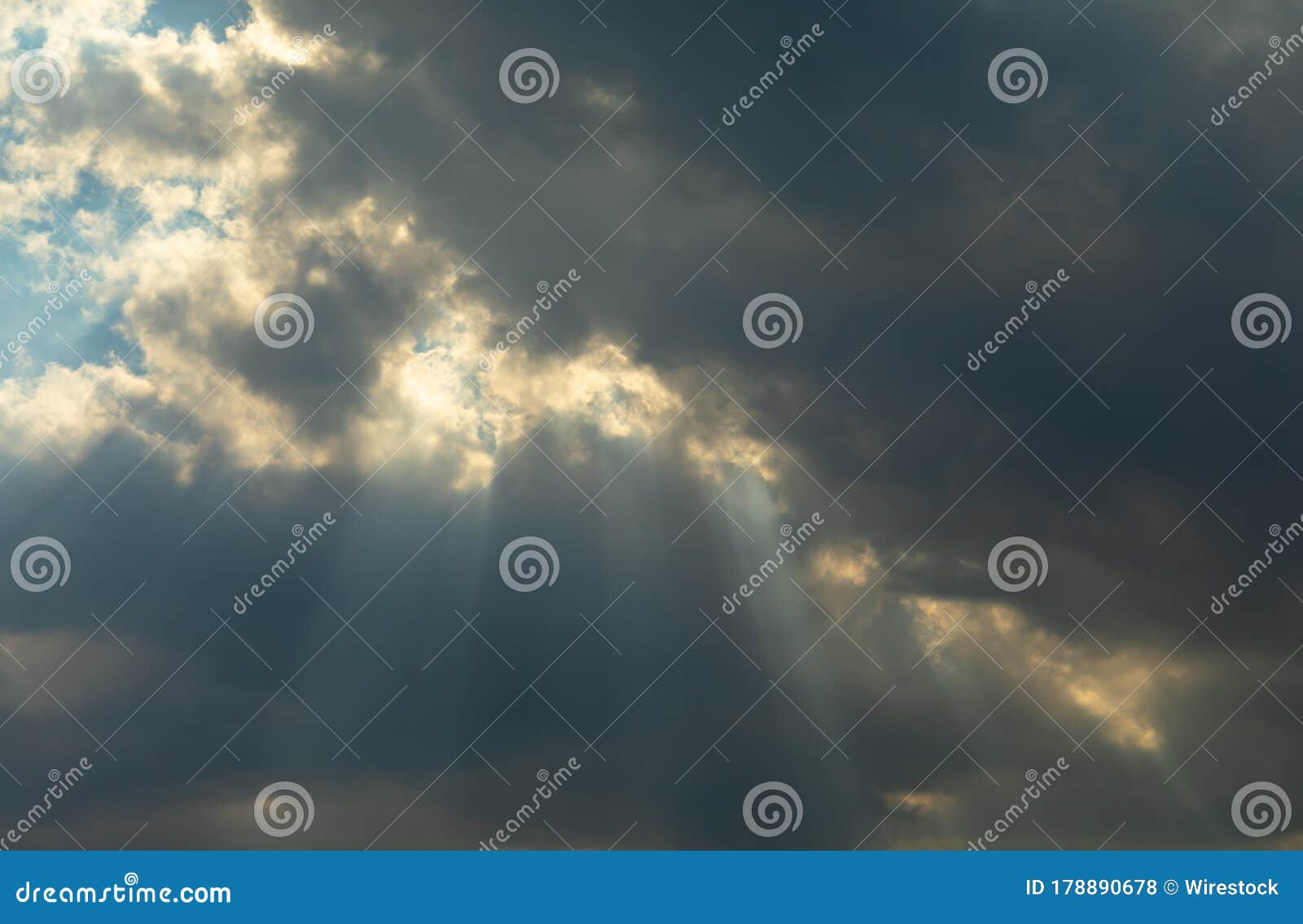 Low Angle Shot of the Sky with the Sun Shining Behind the Clouds Stock ...