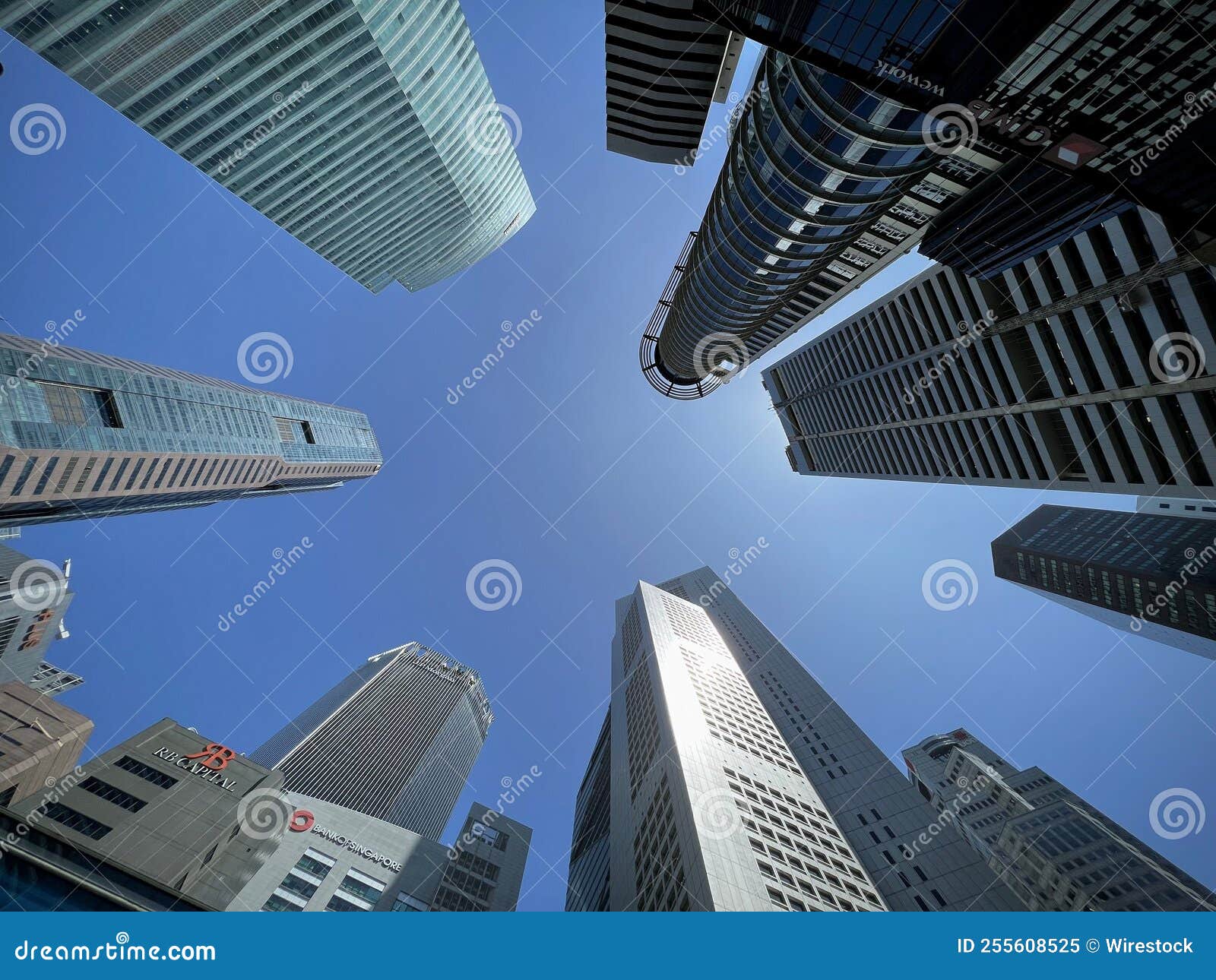 Low-angle Shot of the Skyscrapers Against a Blue Sky Background Stock ...