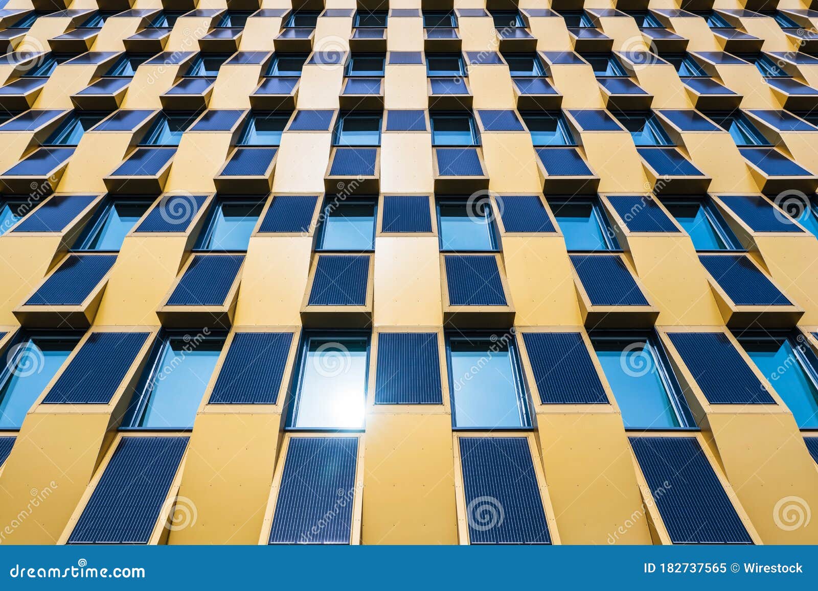 Low Angle Shot of Solar Panels with Glass Windows on a Side of a ...