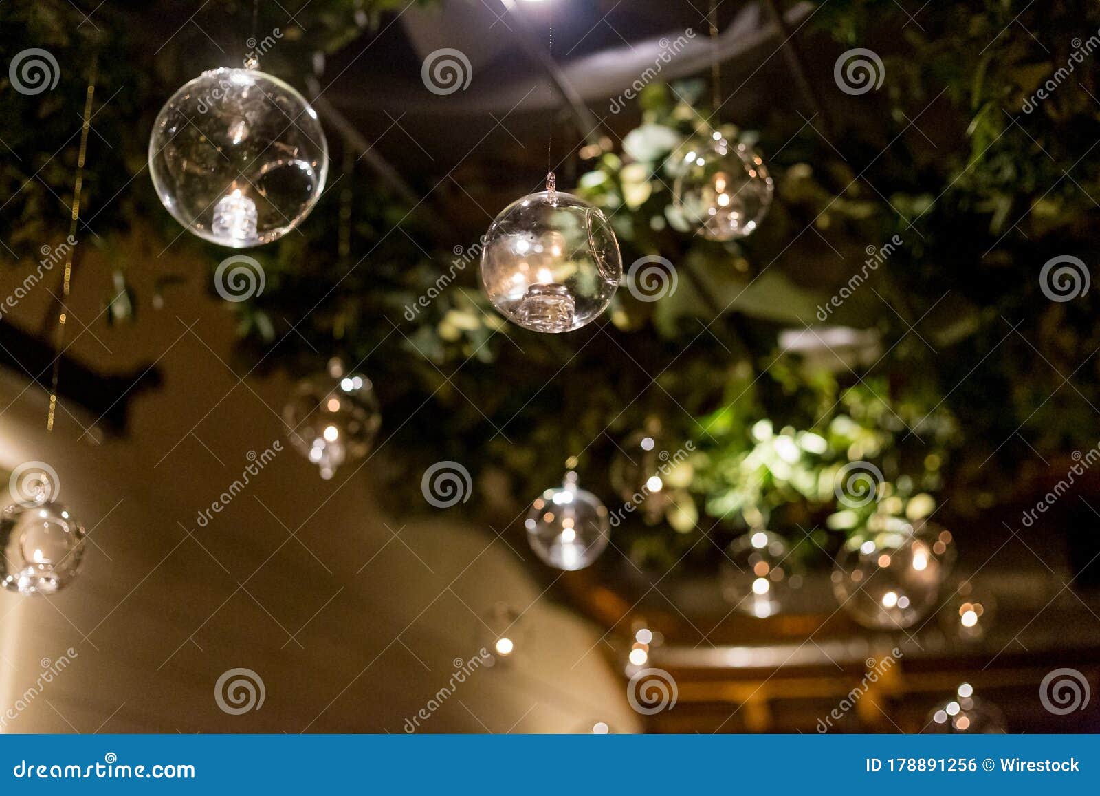 Low Angle Shot of Spherical Glass Decorations Hung from the Ceiling ...
