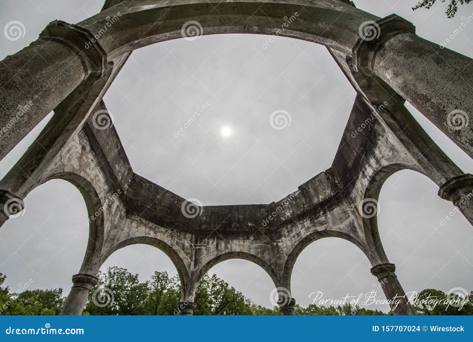Low Angle Shot of a Stone Round Structure on Pillars or Columns Under a ...