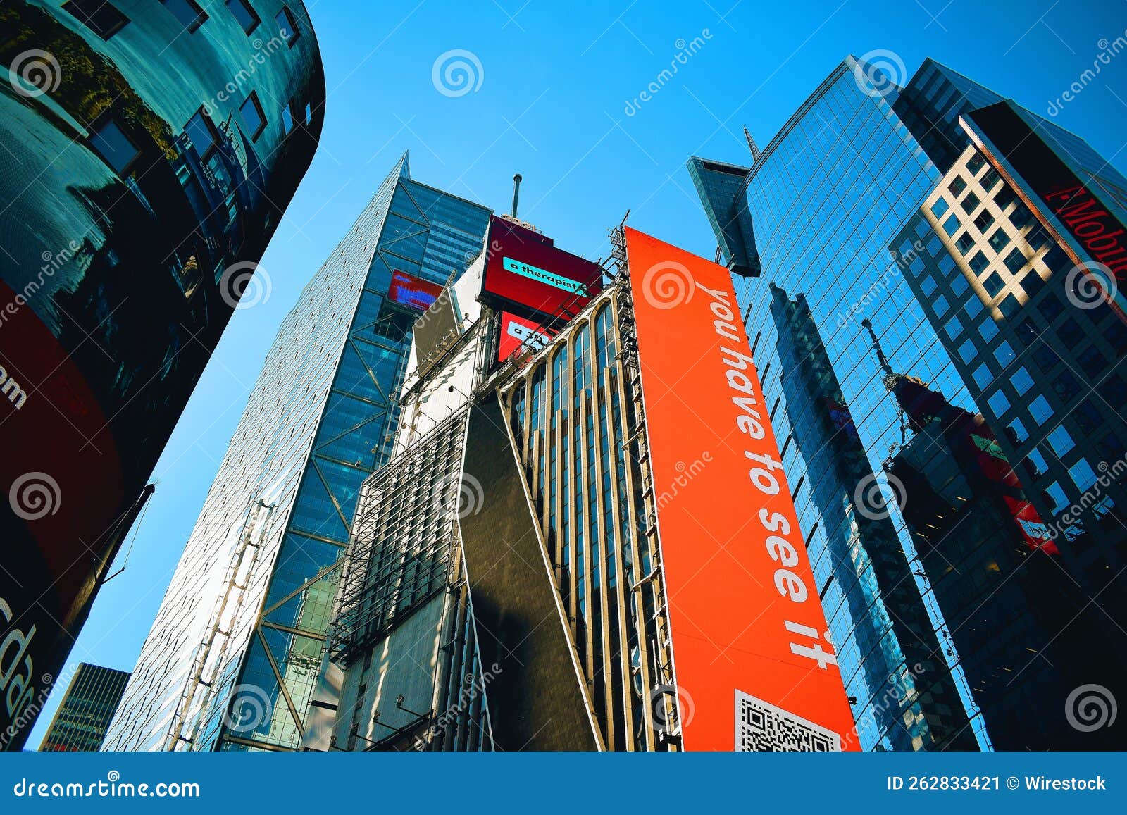Low-angle Shot of Time Square Buildings with Advertisements Under the ...