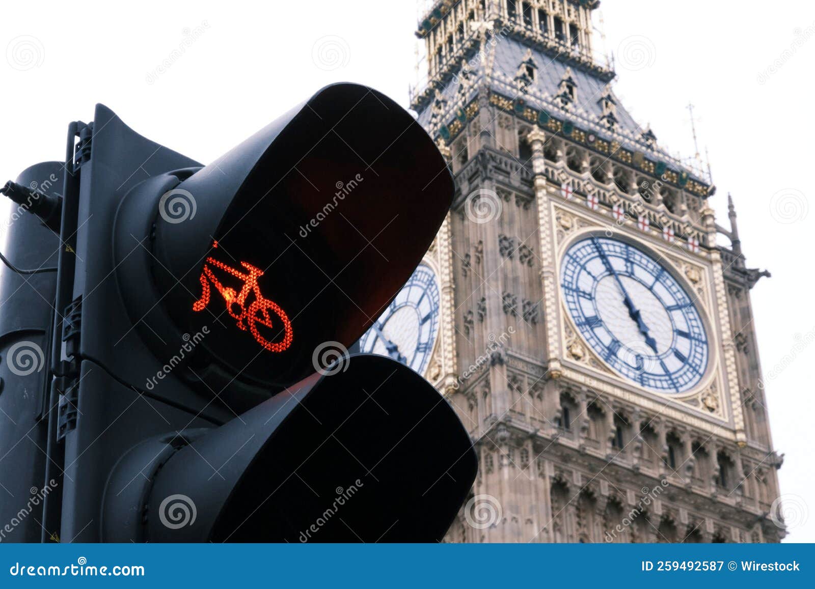 Low Angle Shot of a Traffic Light and a Clock on the Tower Stock Image ...