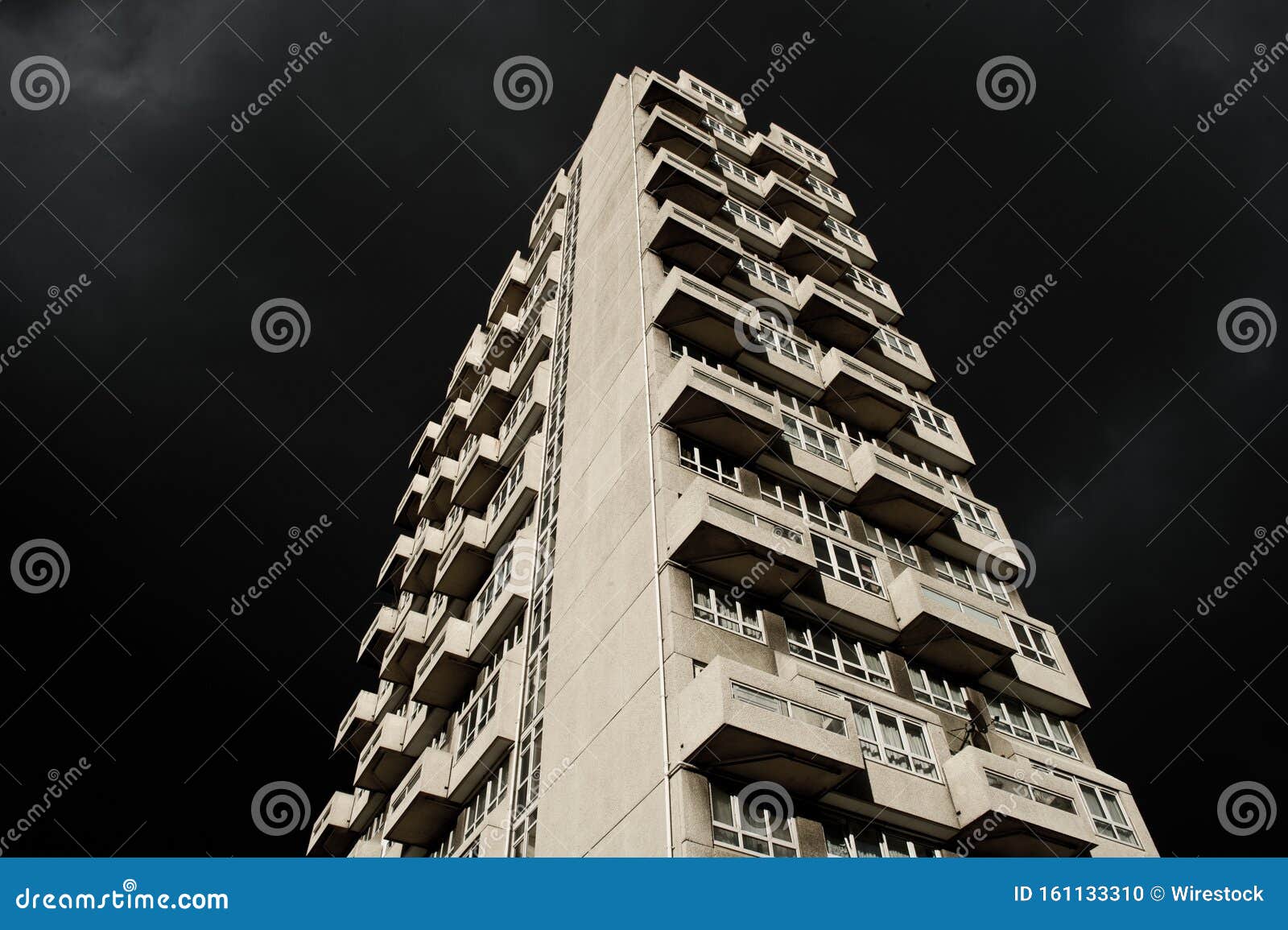 Low Angle Shot of a White High-rise Building Under the Dark Night Sky ...
