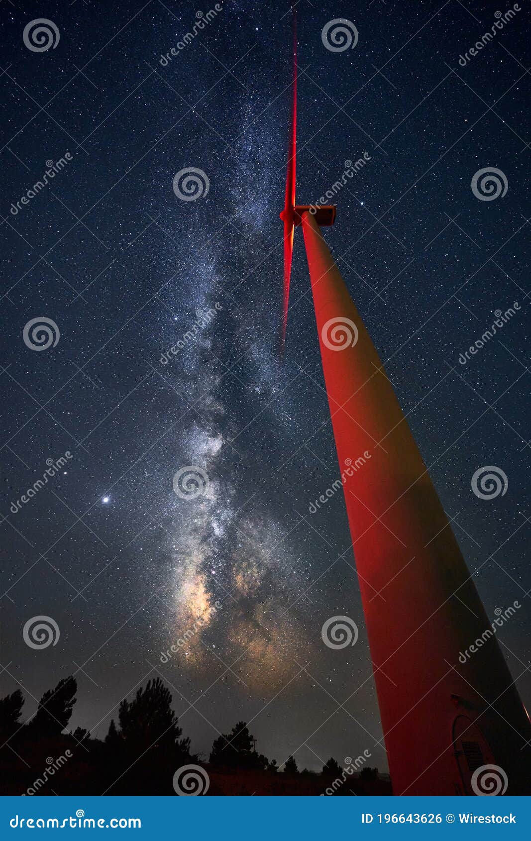 Low Angle Shot of a Windmill and a Beautiful Milky Way Galaxy on a ...