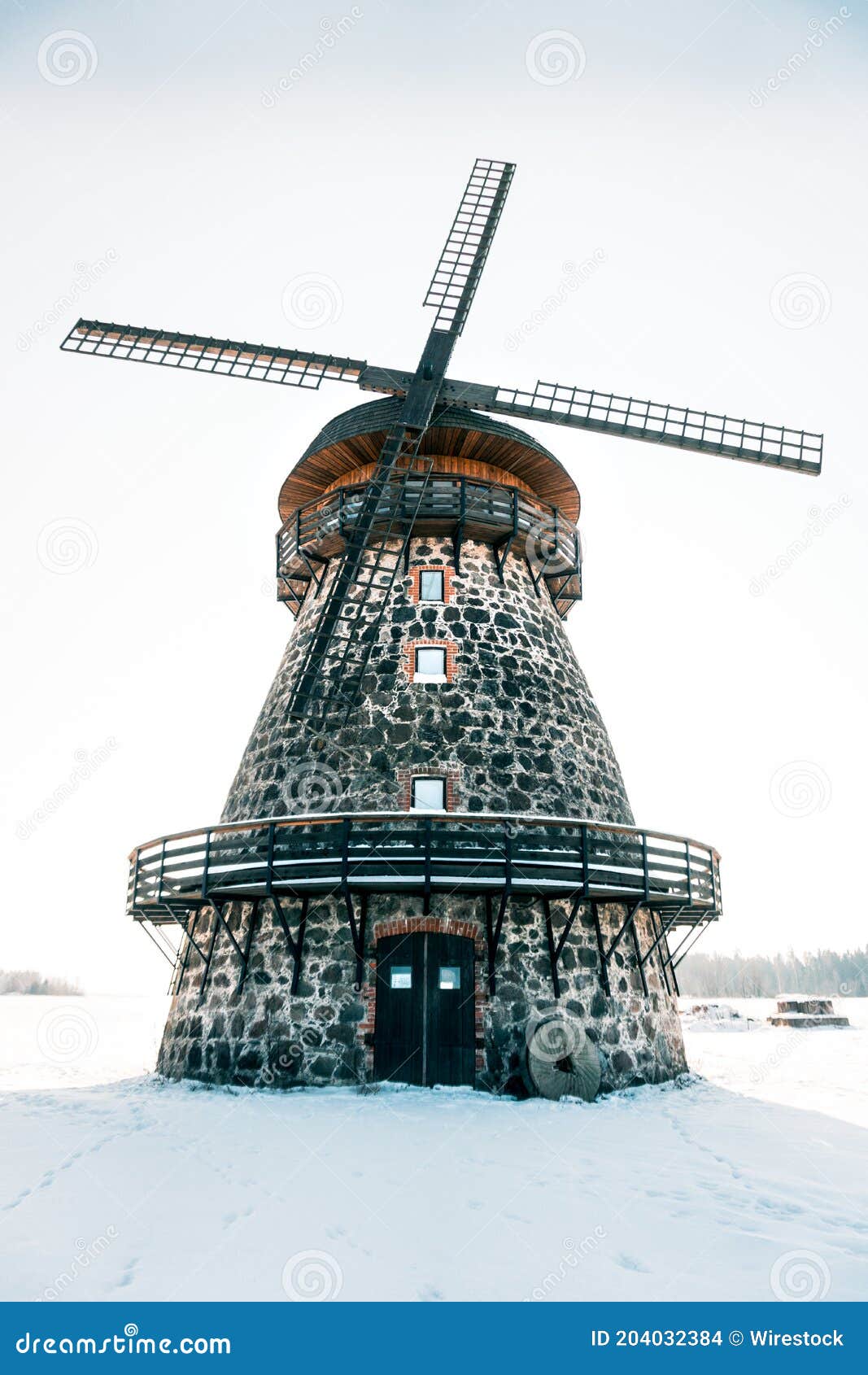 Low Angle Shot of a Windmill in the Snow Stock Photo - Image of snow ...