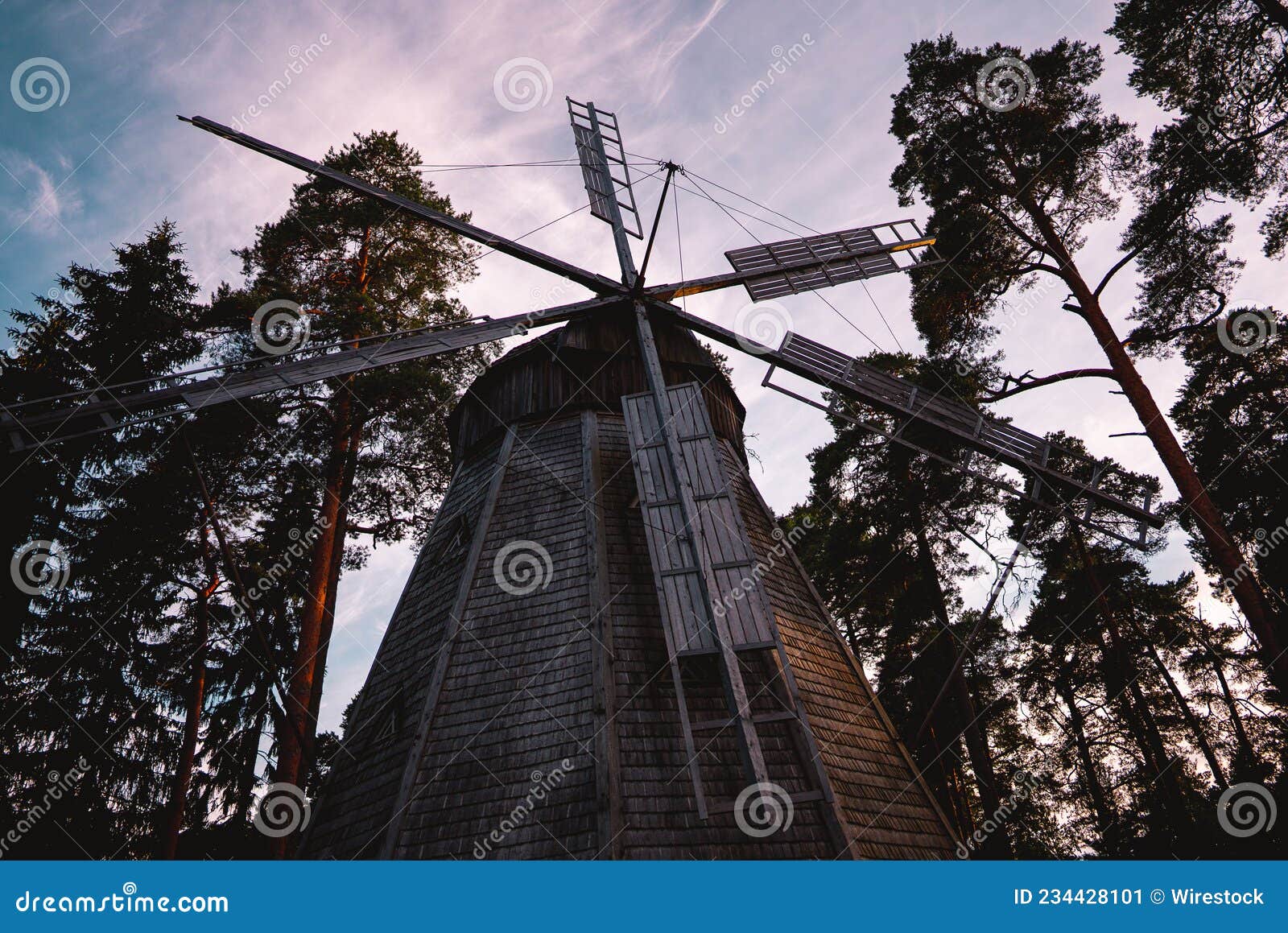 Low Angle Shot of the Windmill Surrounded by Trees. Stock Image - Image ...