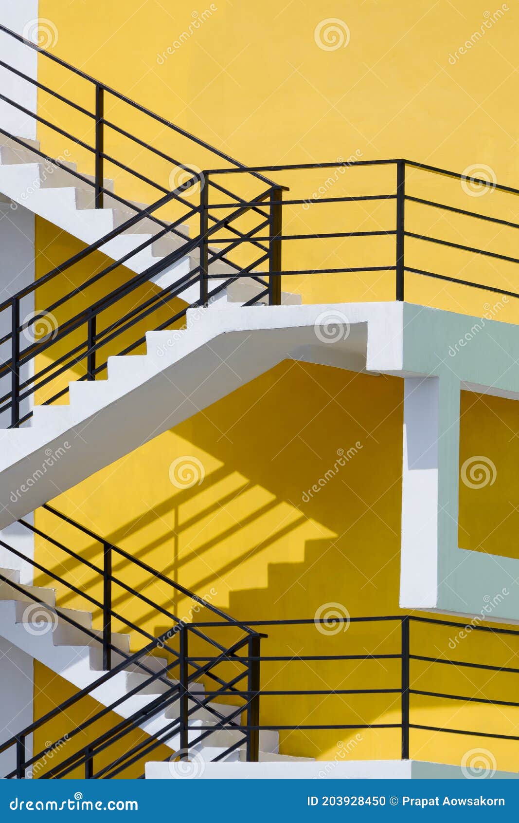 Side View of Fire Escape Outside of Yellow Building Wall in Vertical ...