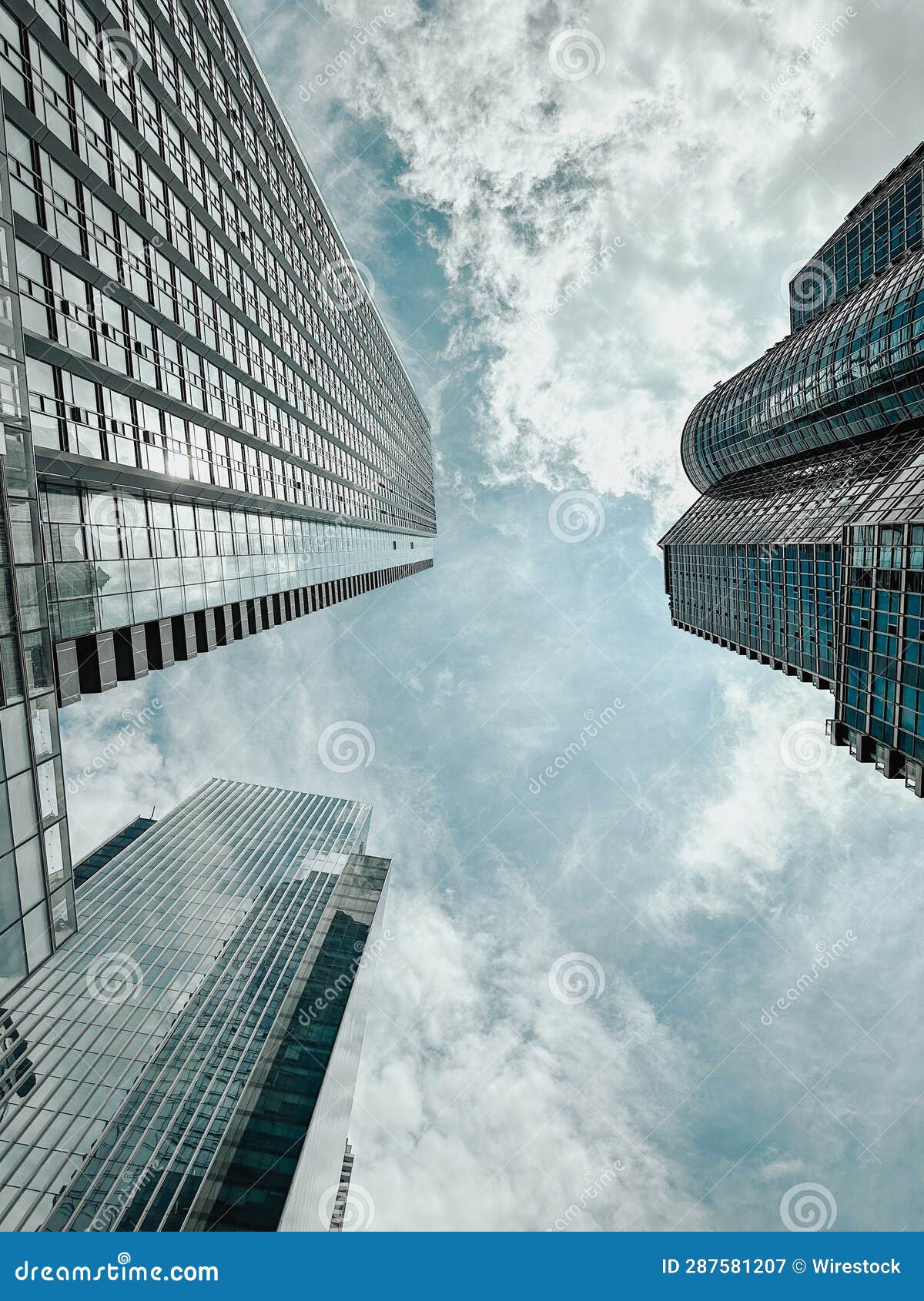 Low Angle of Skyscrapers Against the Cloudy Blue Sky Editorial ...