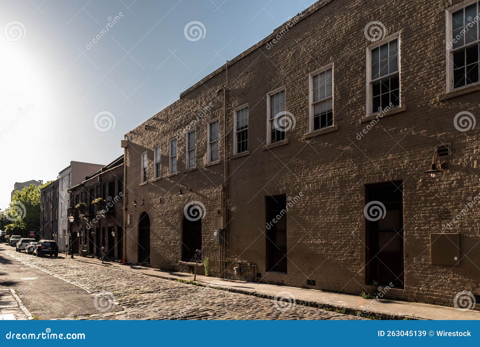 Low-angle of Street View with an Old Building Cobblestone Sunlight ...
