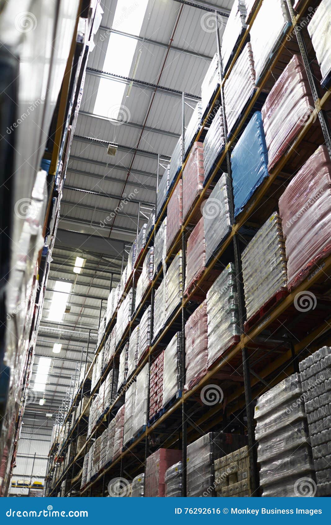 Low Angle Vertical View of Stock in a Distribution Warehouse Stock ...