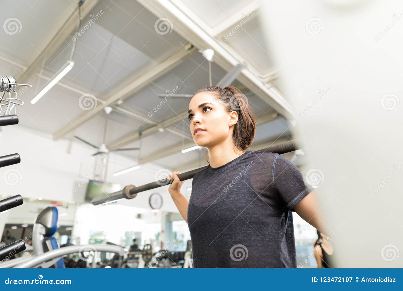 Athletic Woman Exercising with Empty Barbell in Gym Stock Image - Image ...
